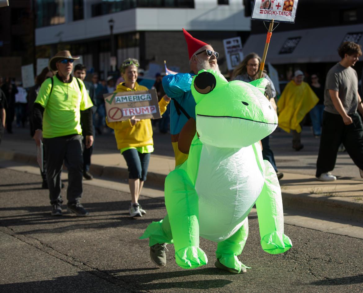 See the Packed Streets, Clever Signs, and Inflatables of the Weekend's ...