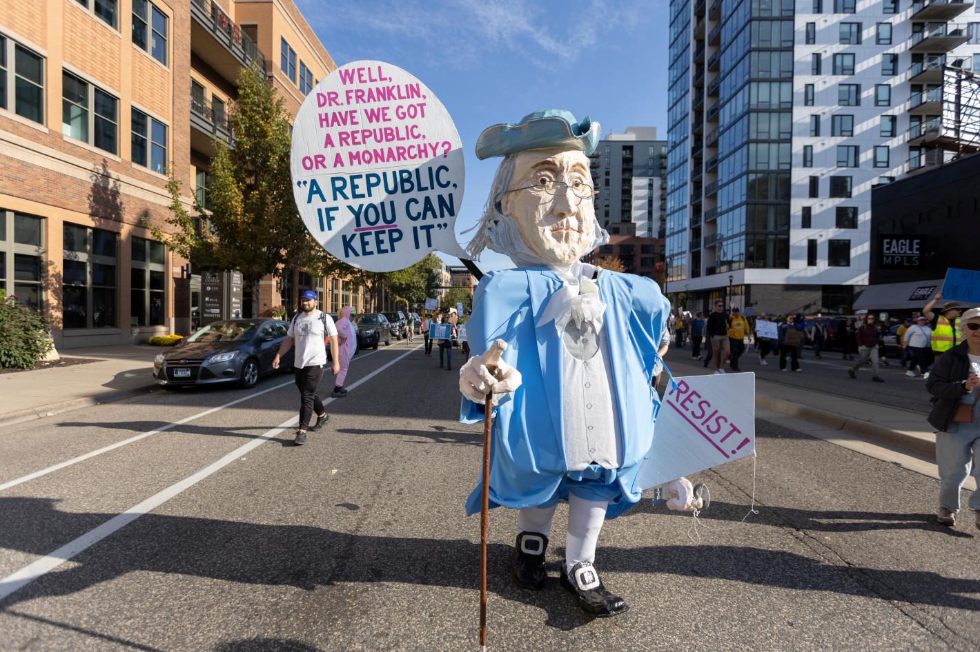 See the Packed Streets, Clever Signs, and Inflatables of the Weekend's ...